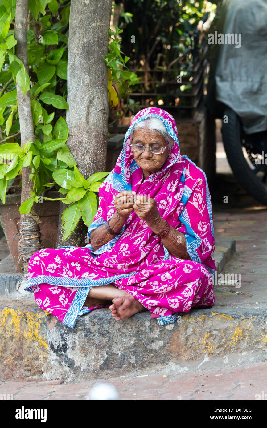 Old south indian woman sitting hi-res stock photography and images - Alamy
