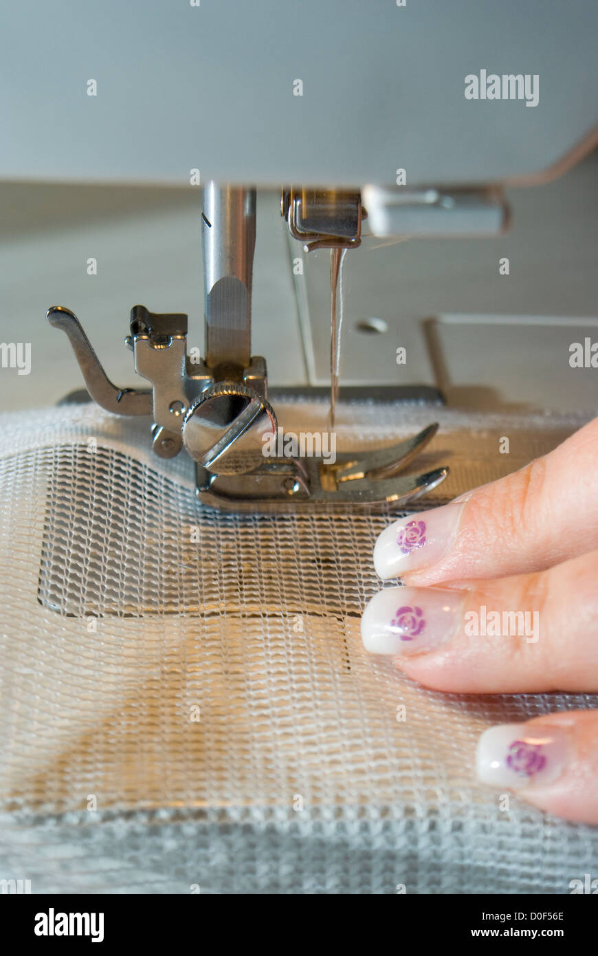 home sewing on a machine Stock Photo - Alamy