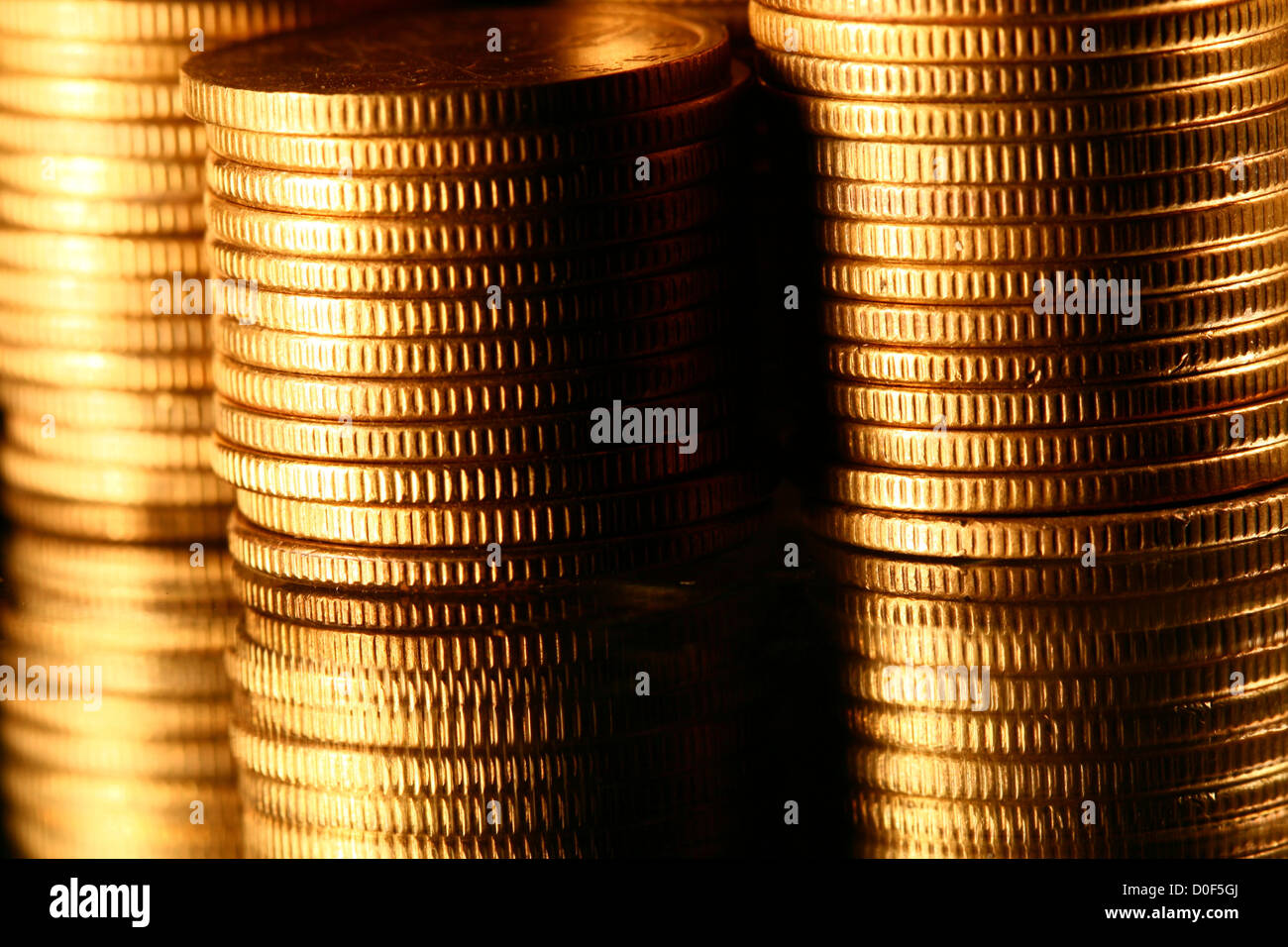 golden piles of coins macro background Stock Photo - Alamy