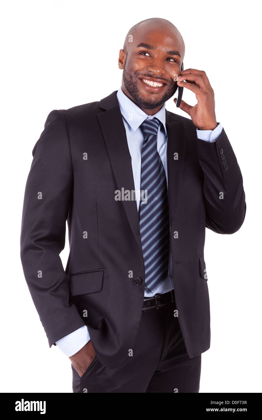 Portrait of a young African American business man making a phone call ...