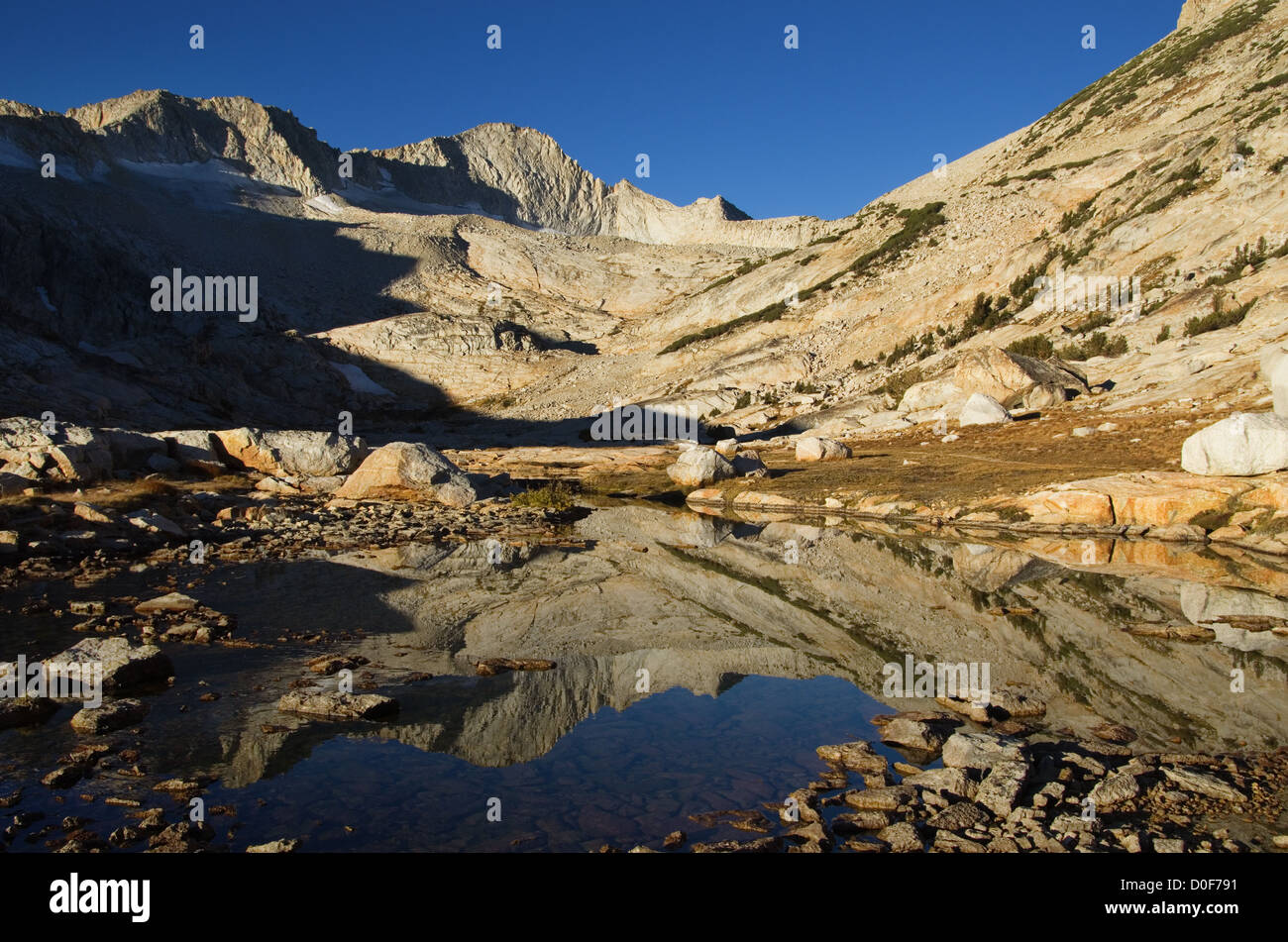 the northeast side of Mount Conness reflected in a lake Stock Photo - Alamy