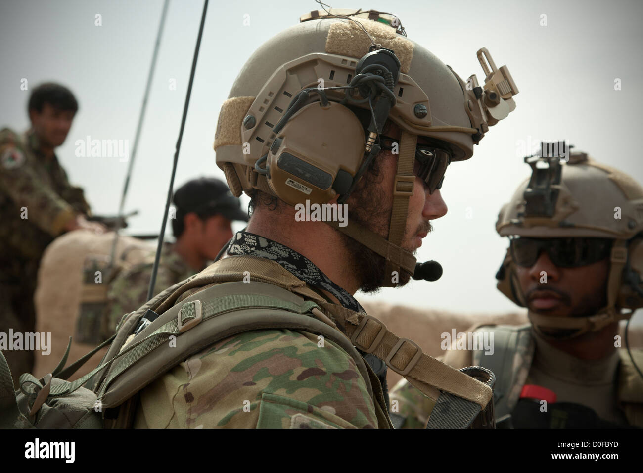 US special forces soldiers provide security during an Afghan National ...
