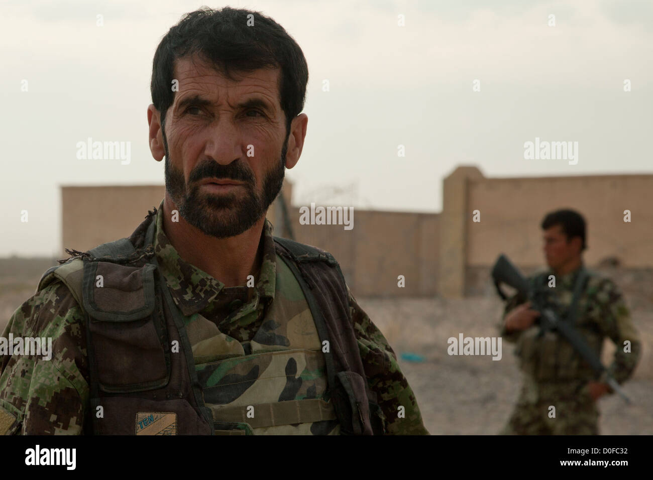 An Afghan National Army Commando maintains security during an Afghan ...