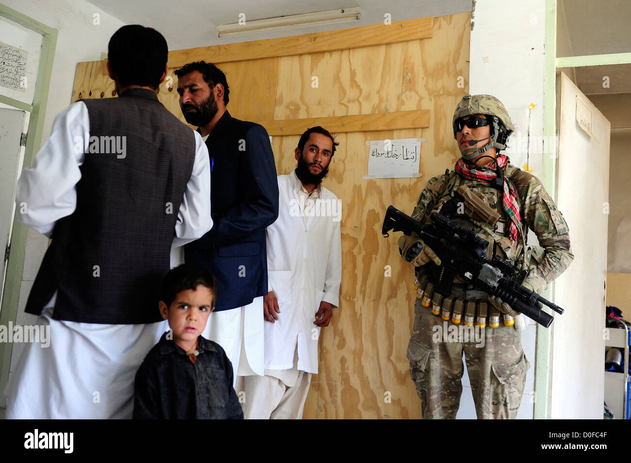 A US Army soldier provides security September 26, 2012 while a meeting ...