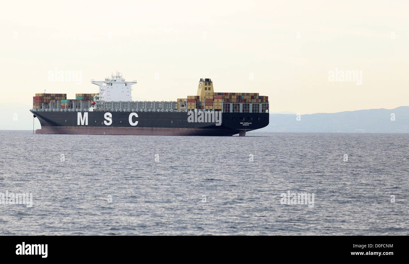 Container ship MSC Rapallo at anchor in the Piraeus Roads, with the ...