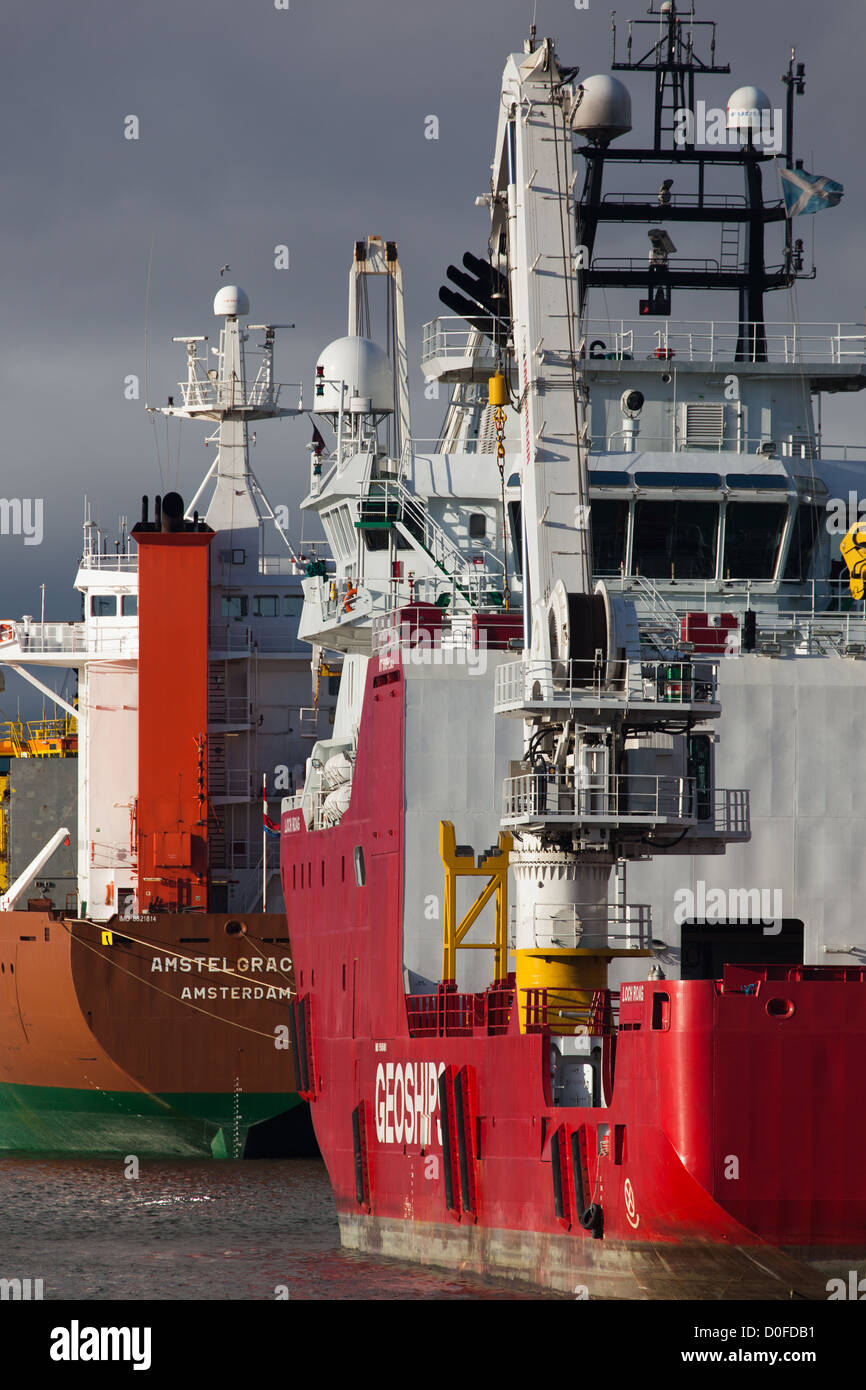 Oil platform support vessels and cargo ships,alongside Montrose Docks ...
