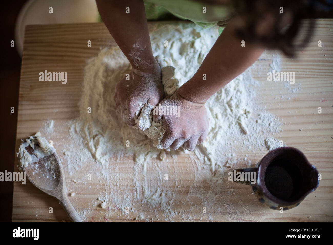 Childrens baking hands, making dough and baking cakes Stock Photo - Alamy