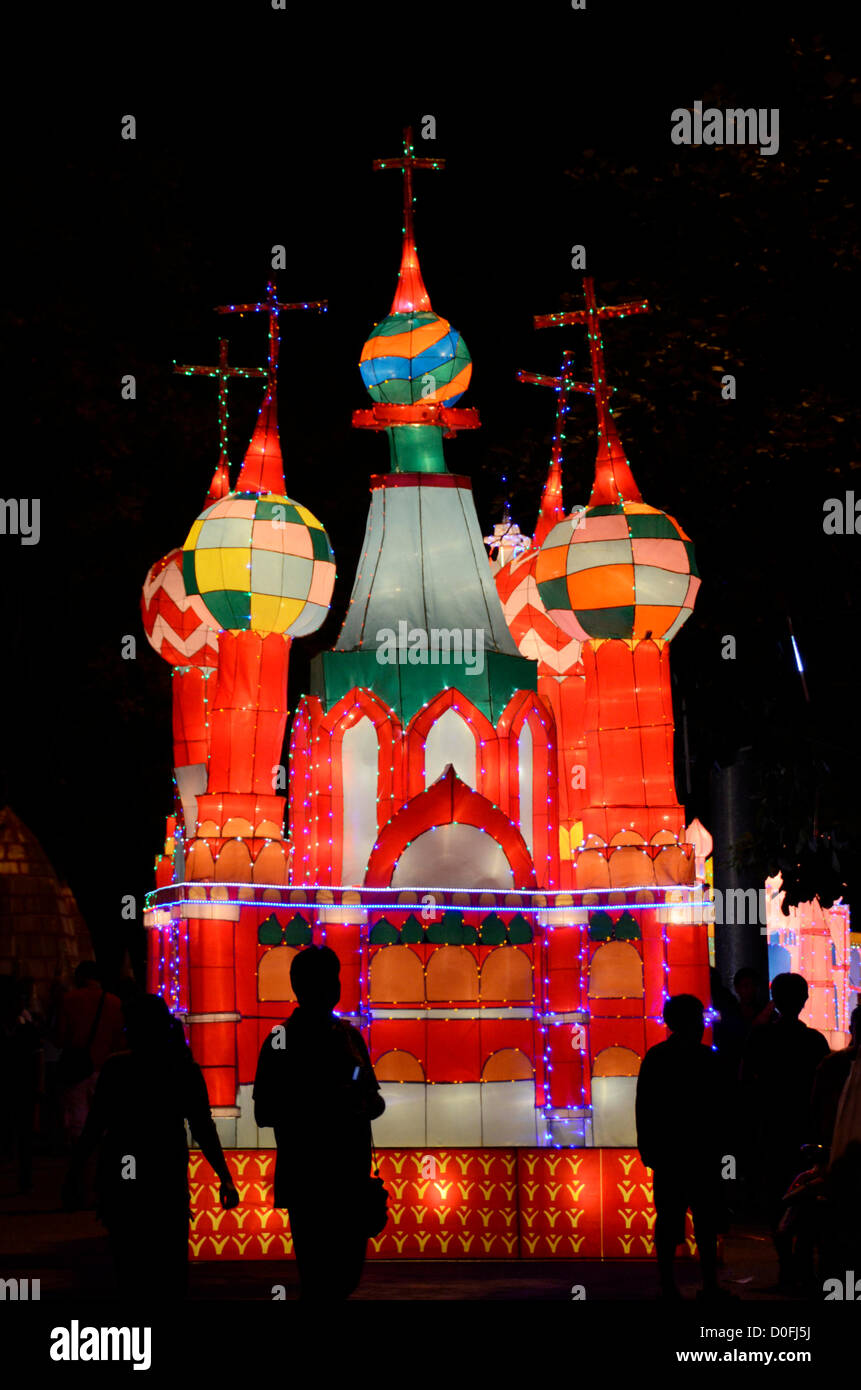 An illuminated inflatable of Saint Basil Cathedral in Moscow forms a ...