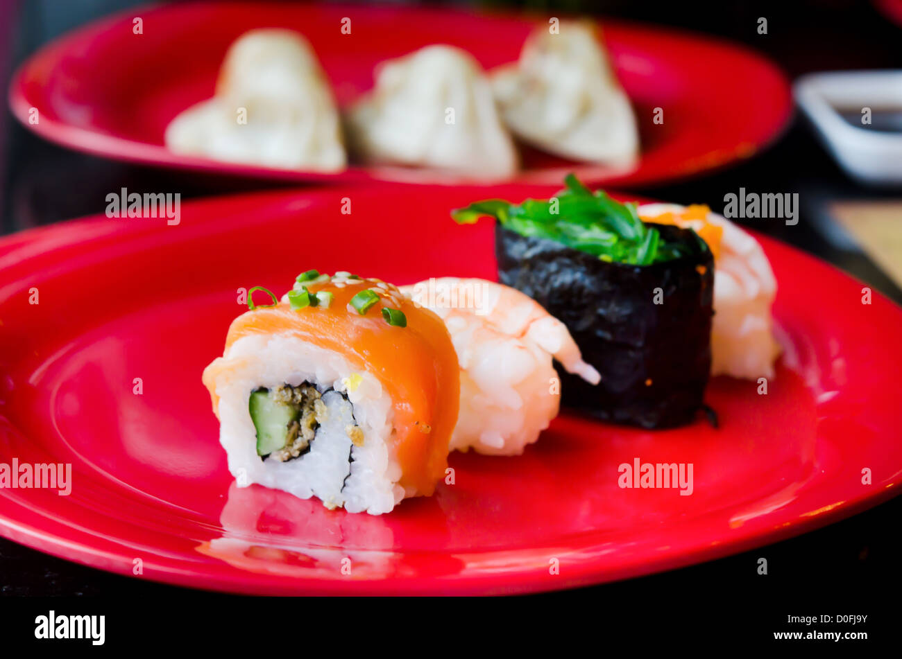 Traditional Japanese food. Sushi on a plate Stock Photo - Alamy