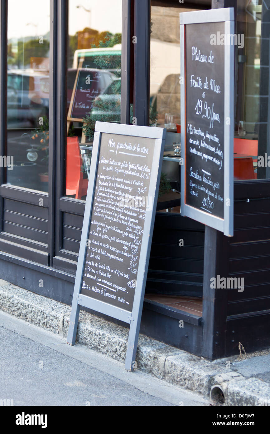 French Cafe Blackboards with seafood menu. Vertical shot Stock Photo ...