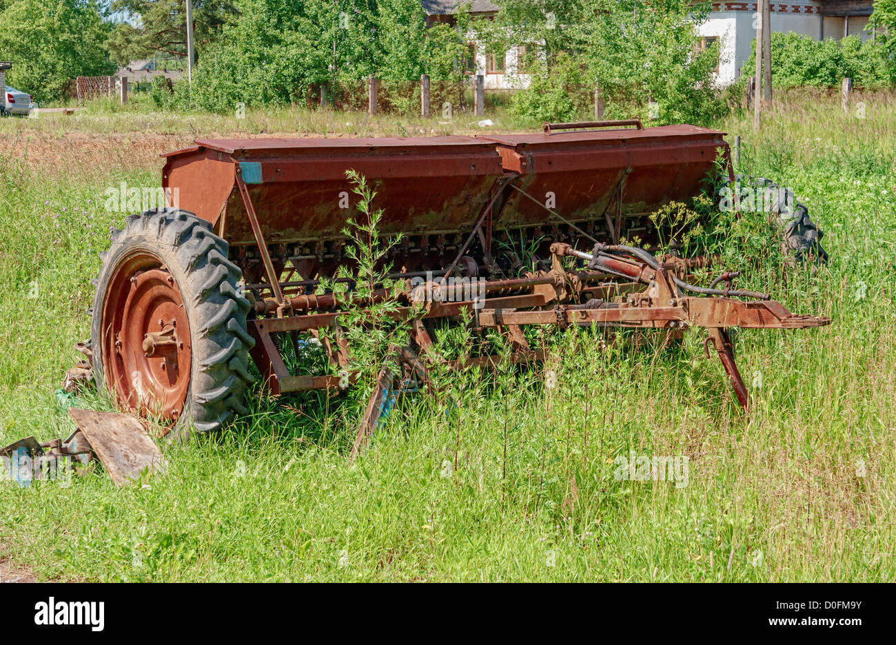 Old broken seeder in village Stock Photo - Alamy