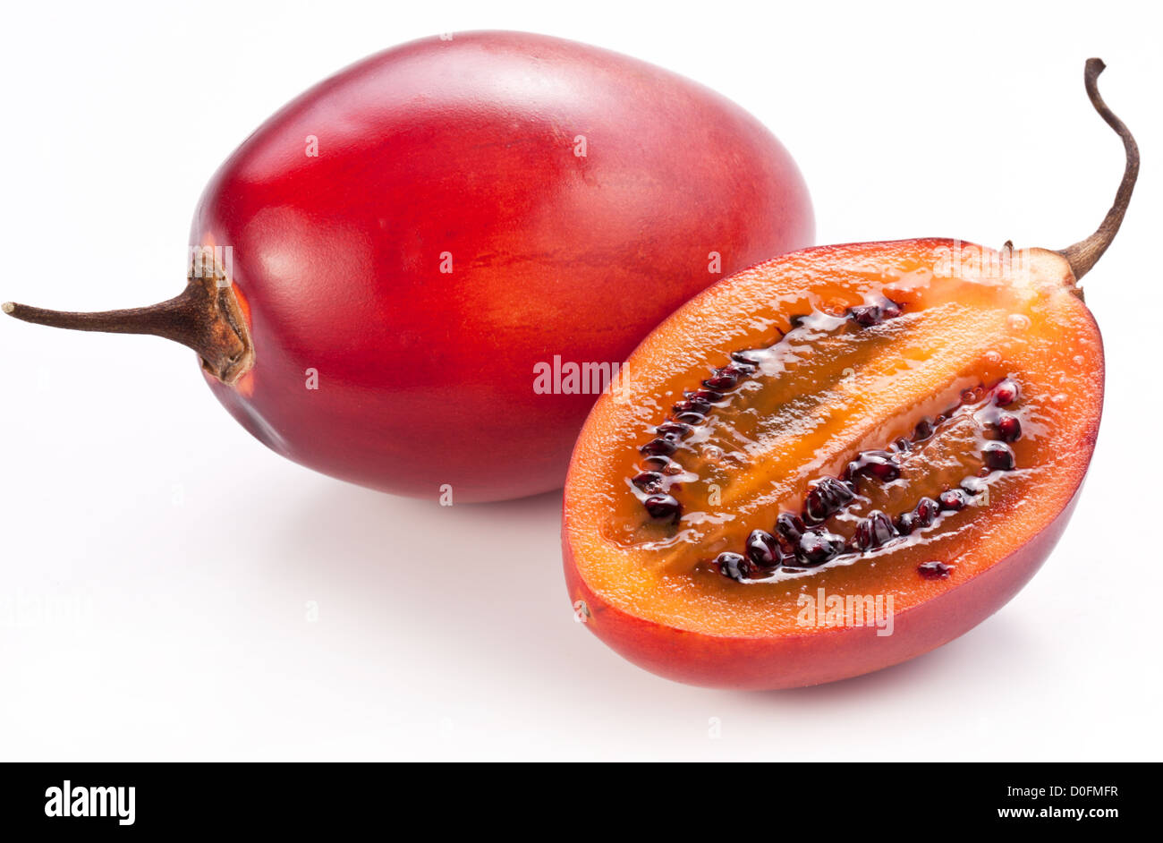 Tamarillo fruits with slice on white background Stock Photo - Alamy