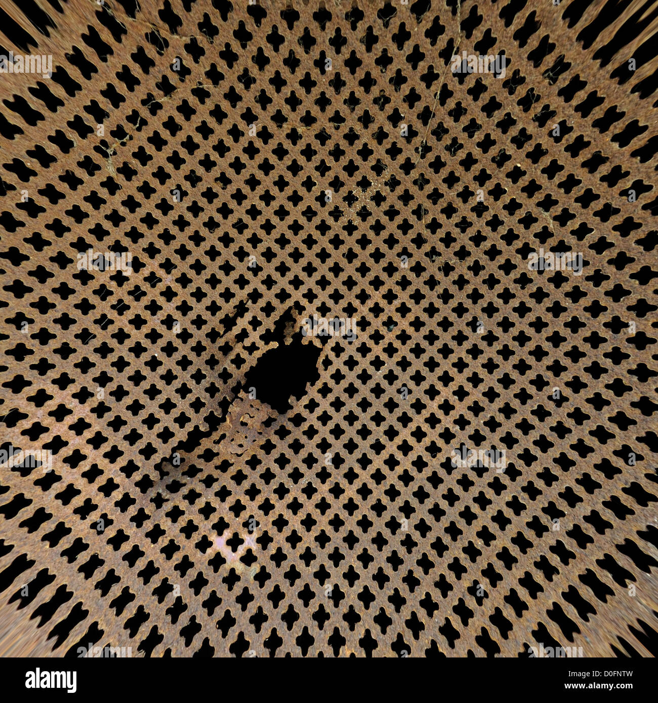 Rusty perforated metal surface. Worn iron grille distorted background ...