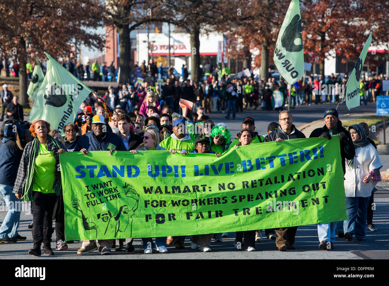 Demonstrators protest against working conditions at Walmart Stock Photo ...