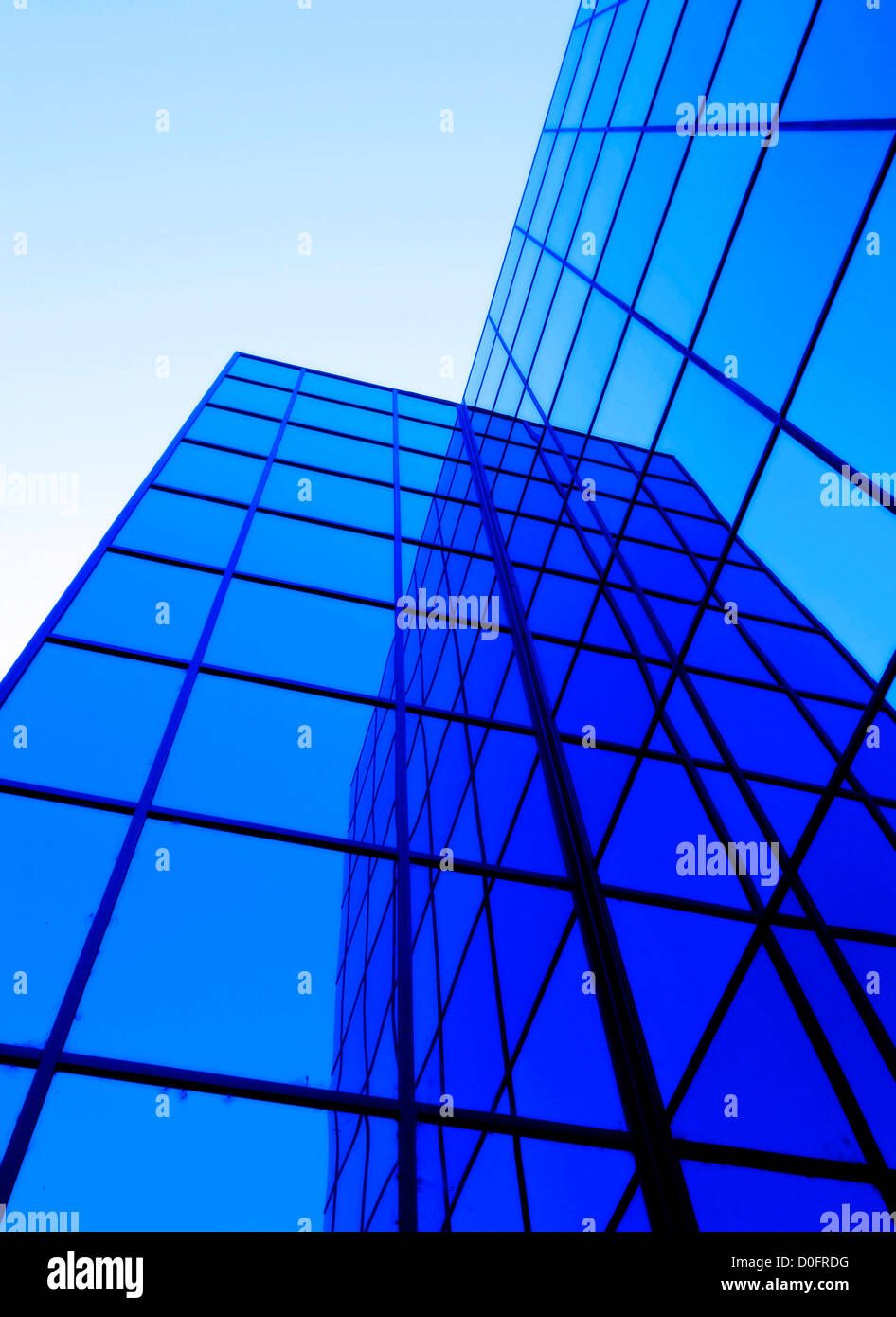 Office building details reflecting, blue sky in geometric windows Stock ...