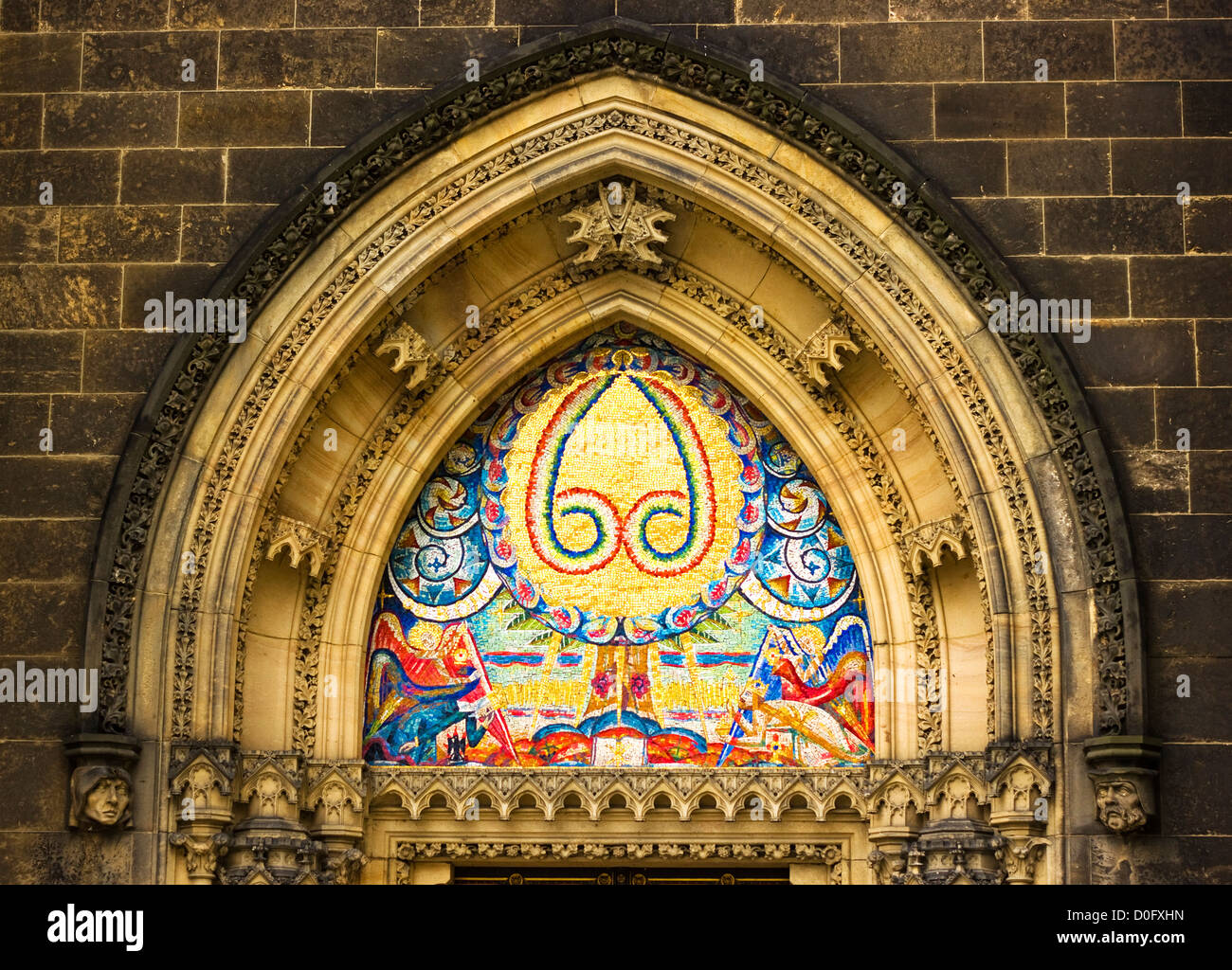 The view of a colored mosaic on an old gotic temple in Prague, Czech ...