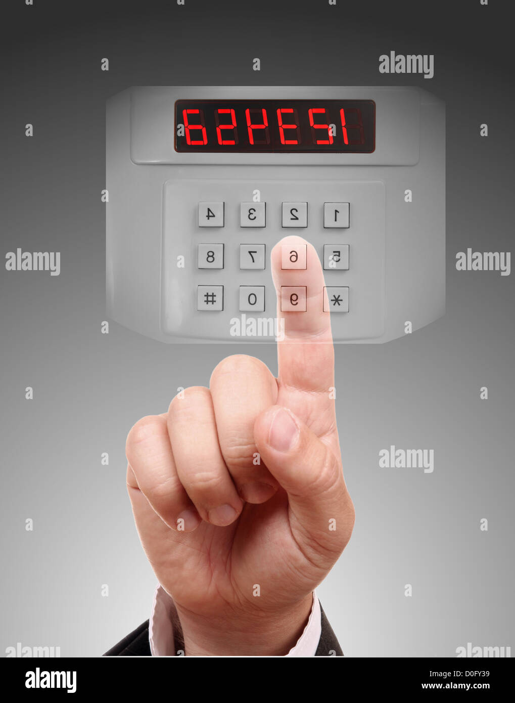 Man entering safe or door code Stock Photo - Alamy