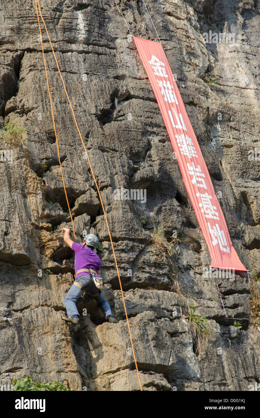 China Guangxi Yangshuo, rock climber Stock Photo - Alamy
