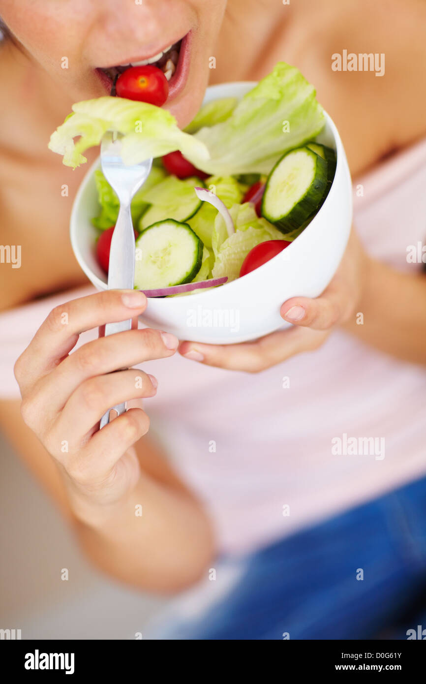 Woman raising up bowl hi-res stock photography and images - Alamy