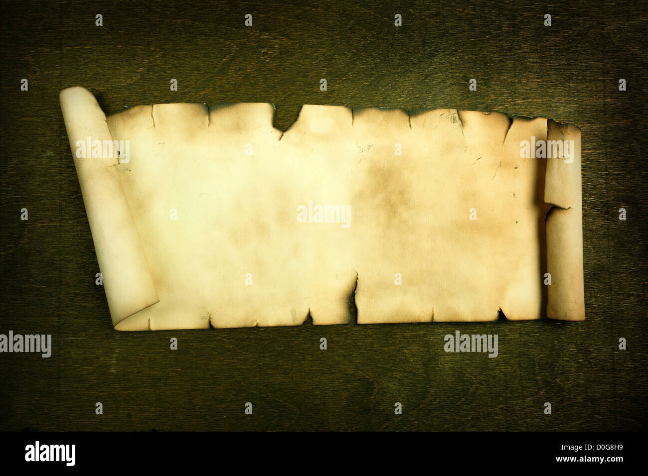 Ancient scroll on wooden table close up Stock Photo - Alamy