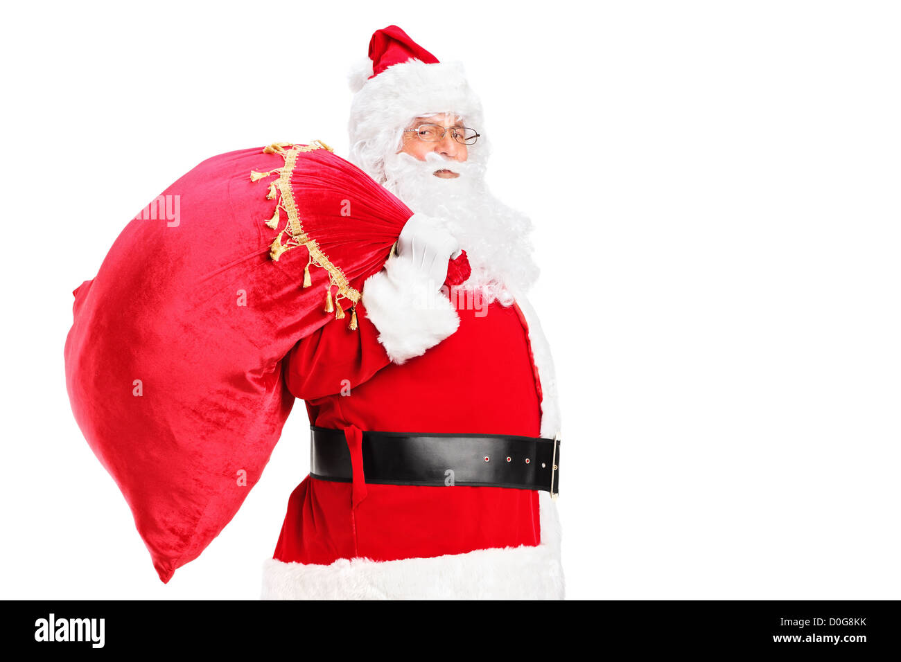 A Santa Claus walking with bag full of gifts og his back isolated on ...