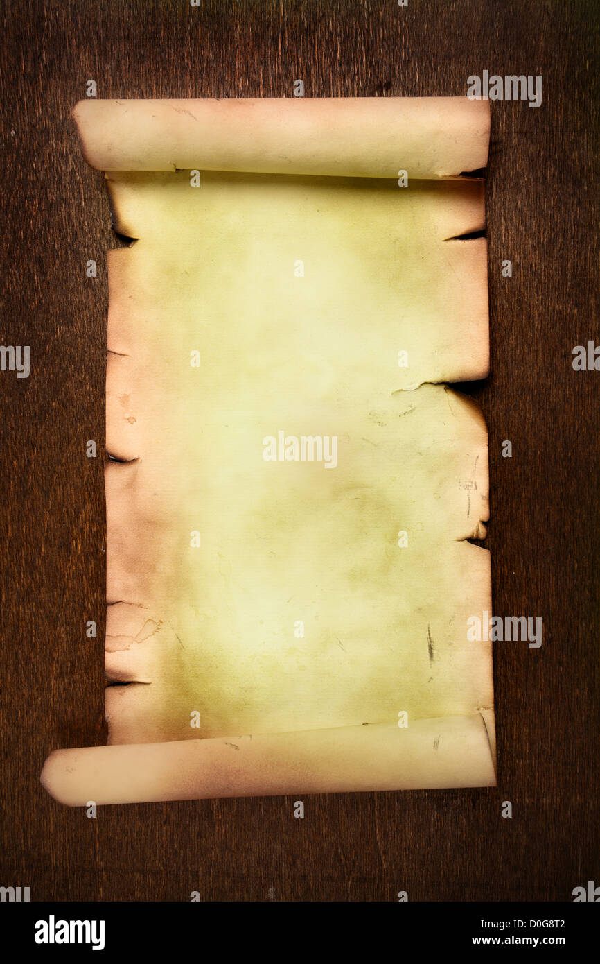 Ancient scroll on wooden table close up Stock Photo - Alamy