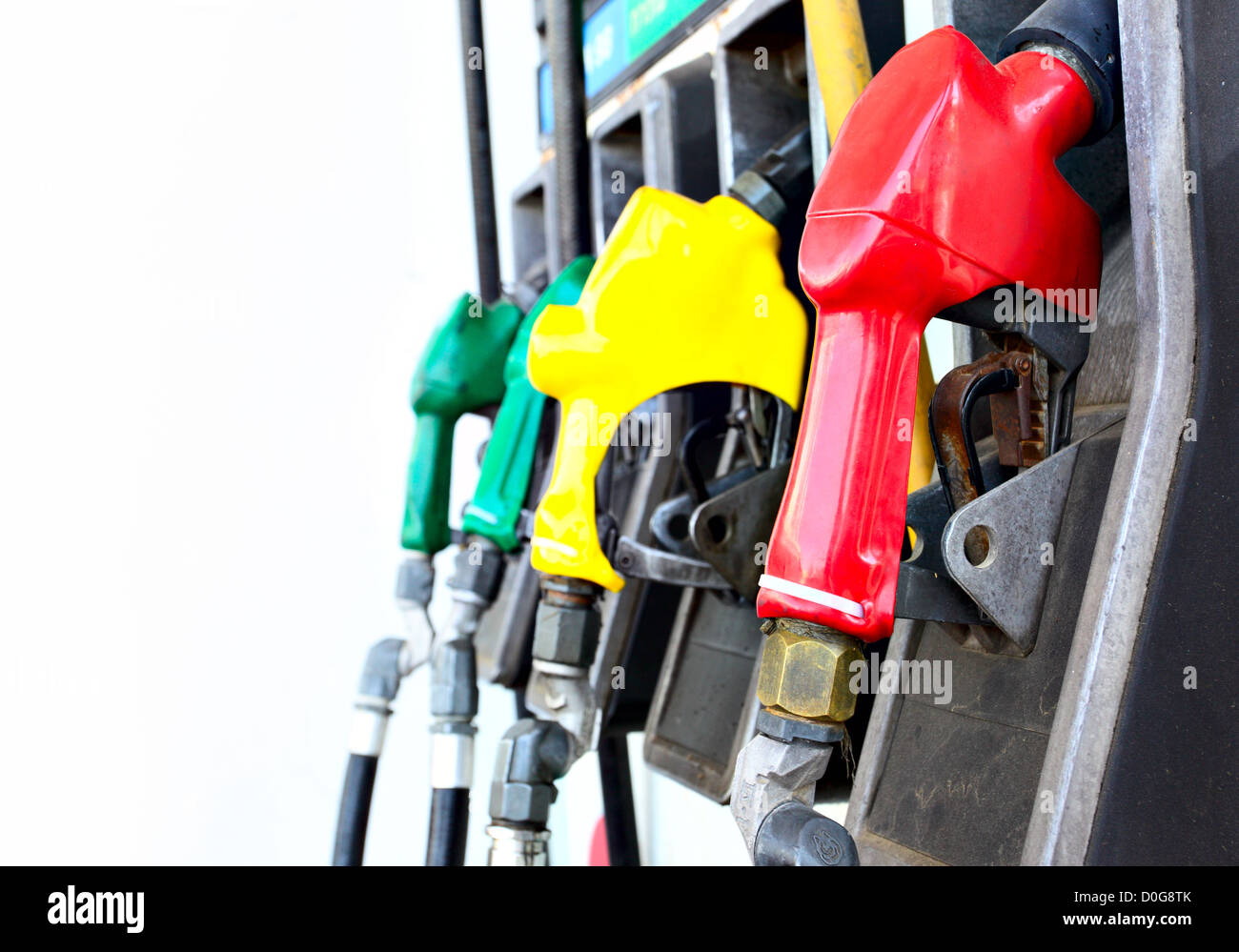 Colorful gas nozzles close up over white background Stock Photo - Alamy