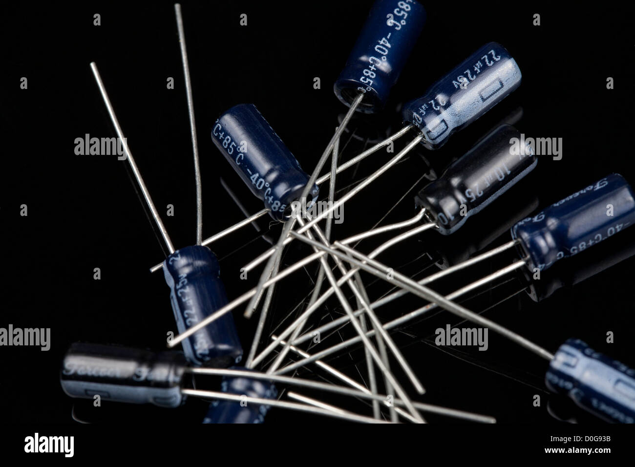 Close up of capacitors on a black background Electrical PCB component ...