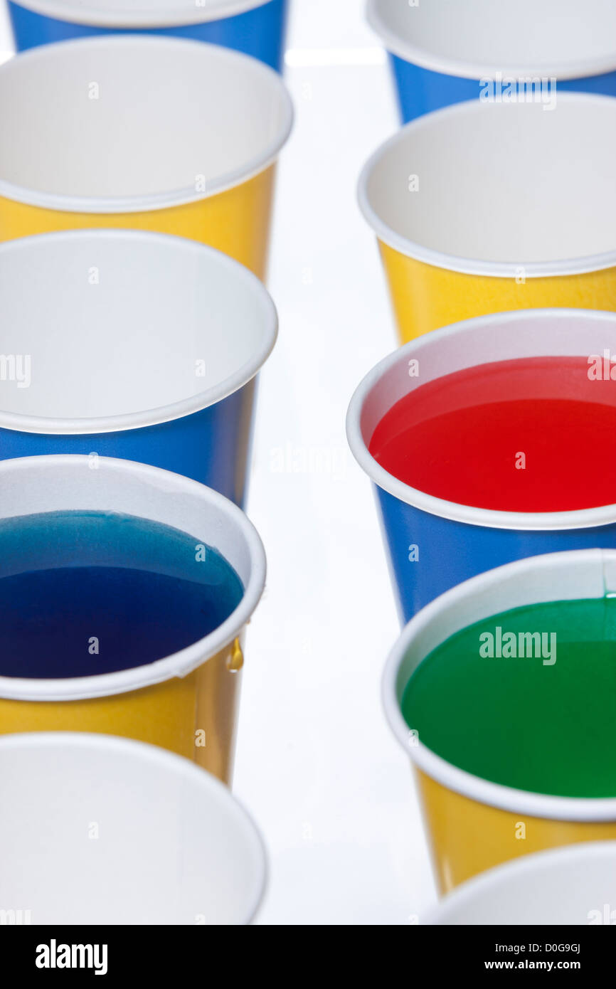 Cups filled with colored liquid Stock Photo - Alamy