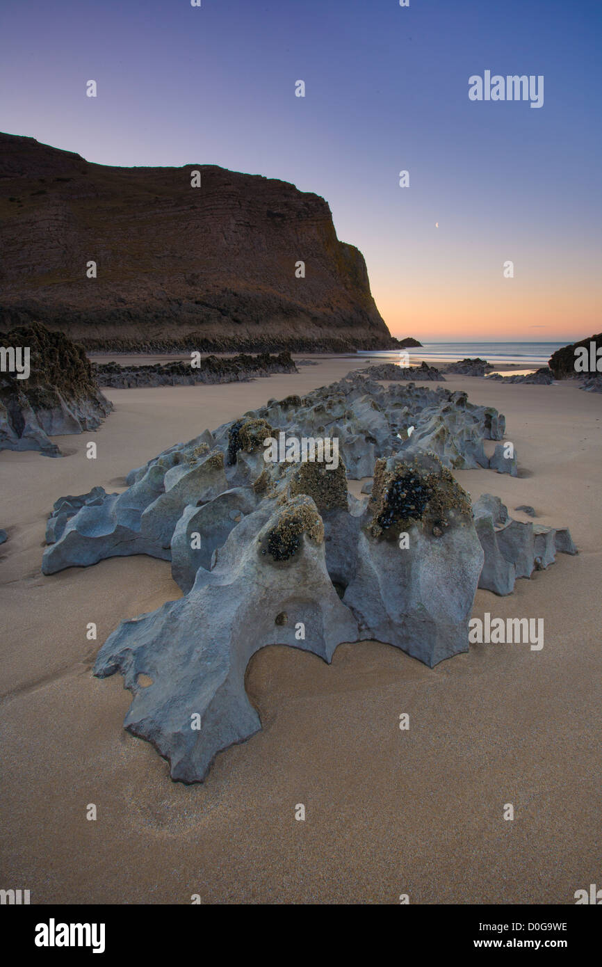 Jagged Limestone rock formations on the beach at Mewslade Bay, Gower ...