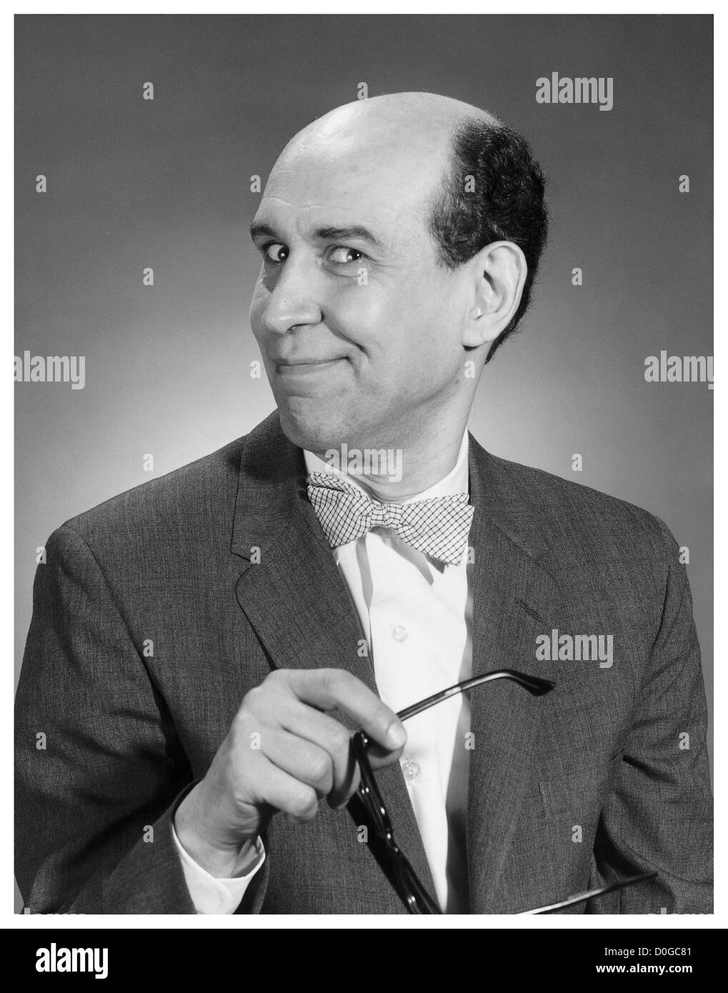 Coy expression hi-res stock photography and images - Alamy