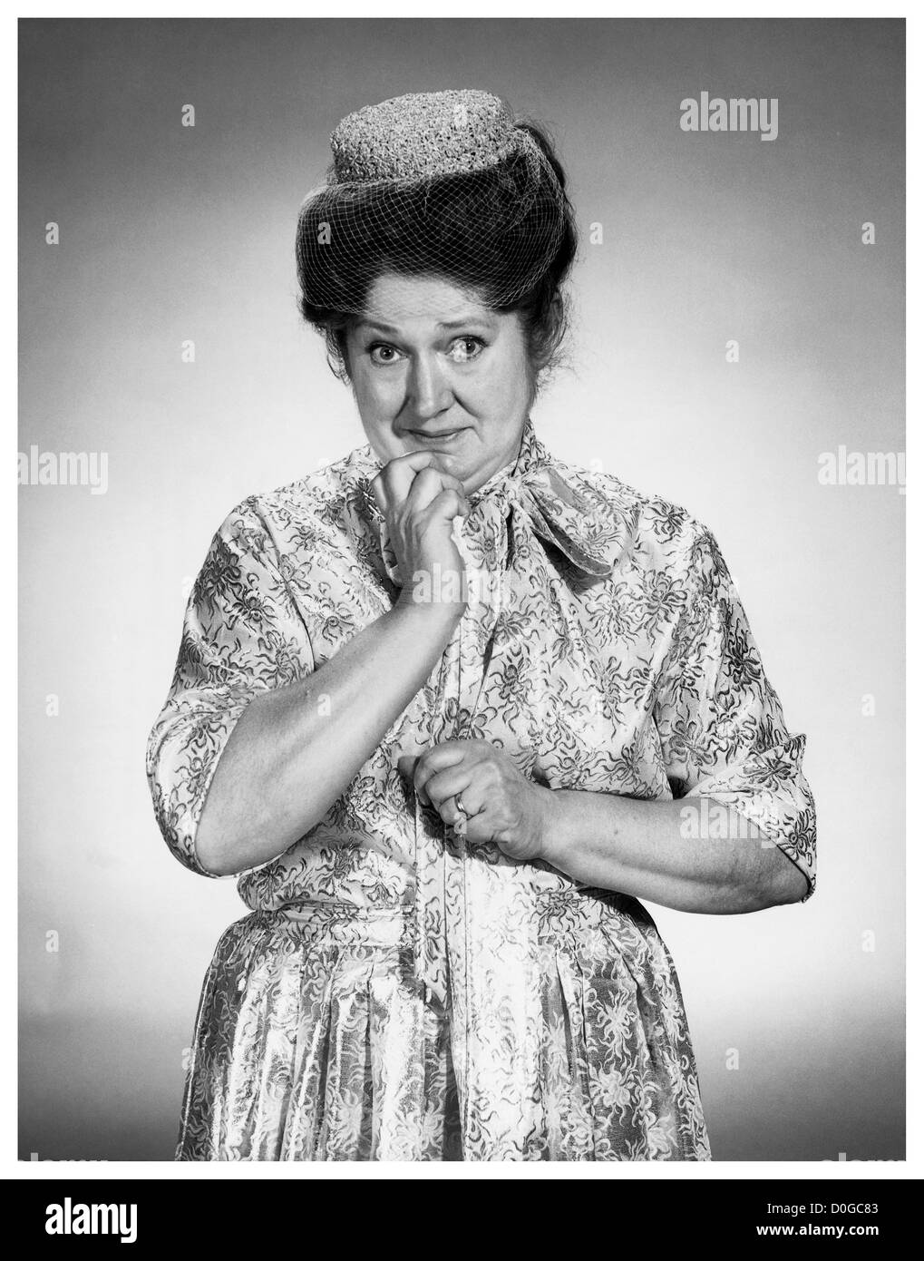 Woman with concerned expression Stock Photo - Alamy