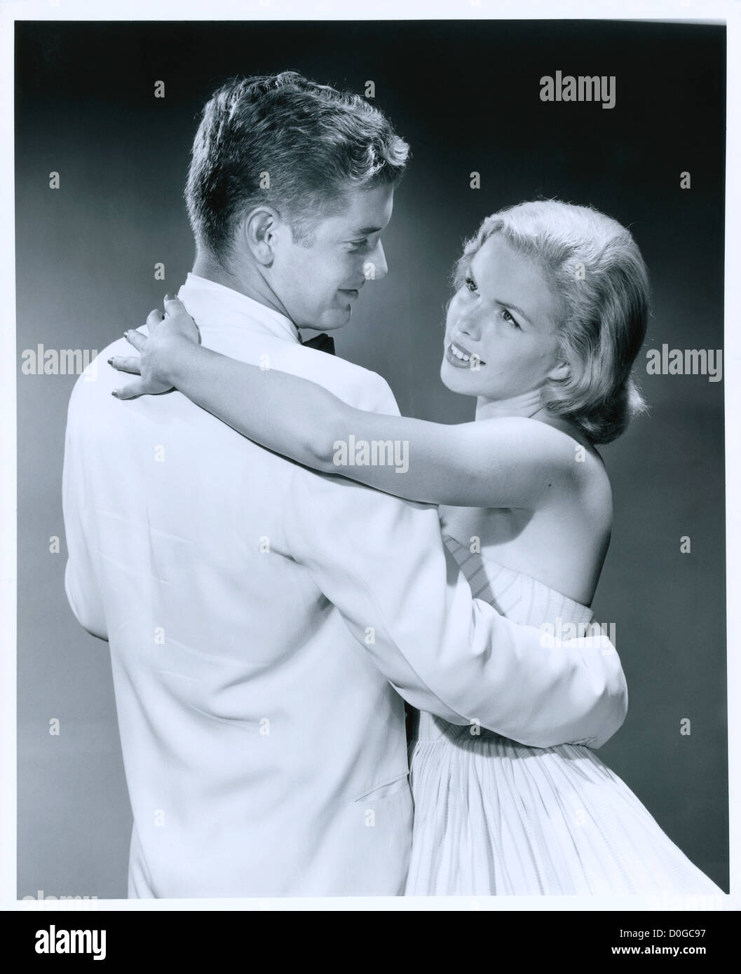 Young couple in formal wear dancing Stock Photo - Alamy