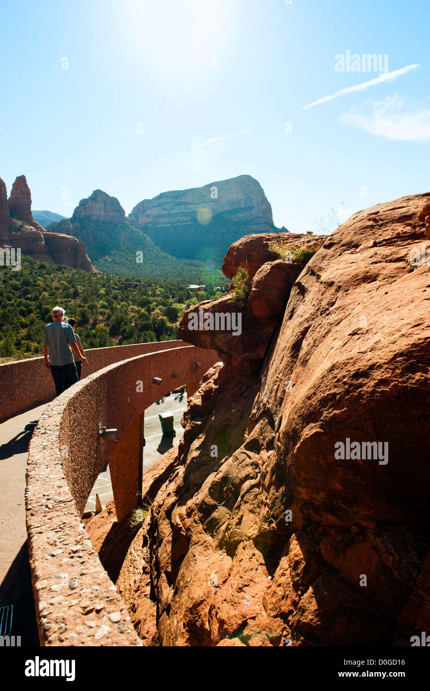 A man walking up the walkway to the Church of the Rock (Chapel of the ...