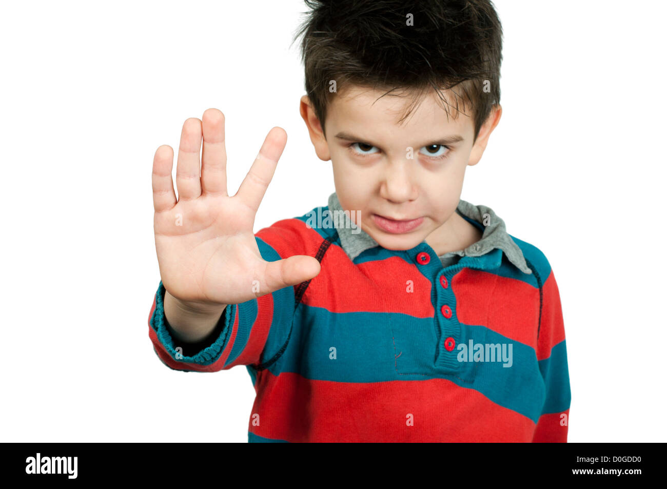 Little boy showing stop with his hand. White isolated Stock Photo - Alamy