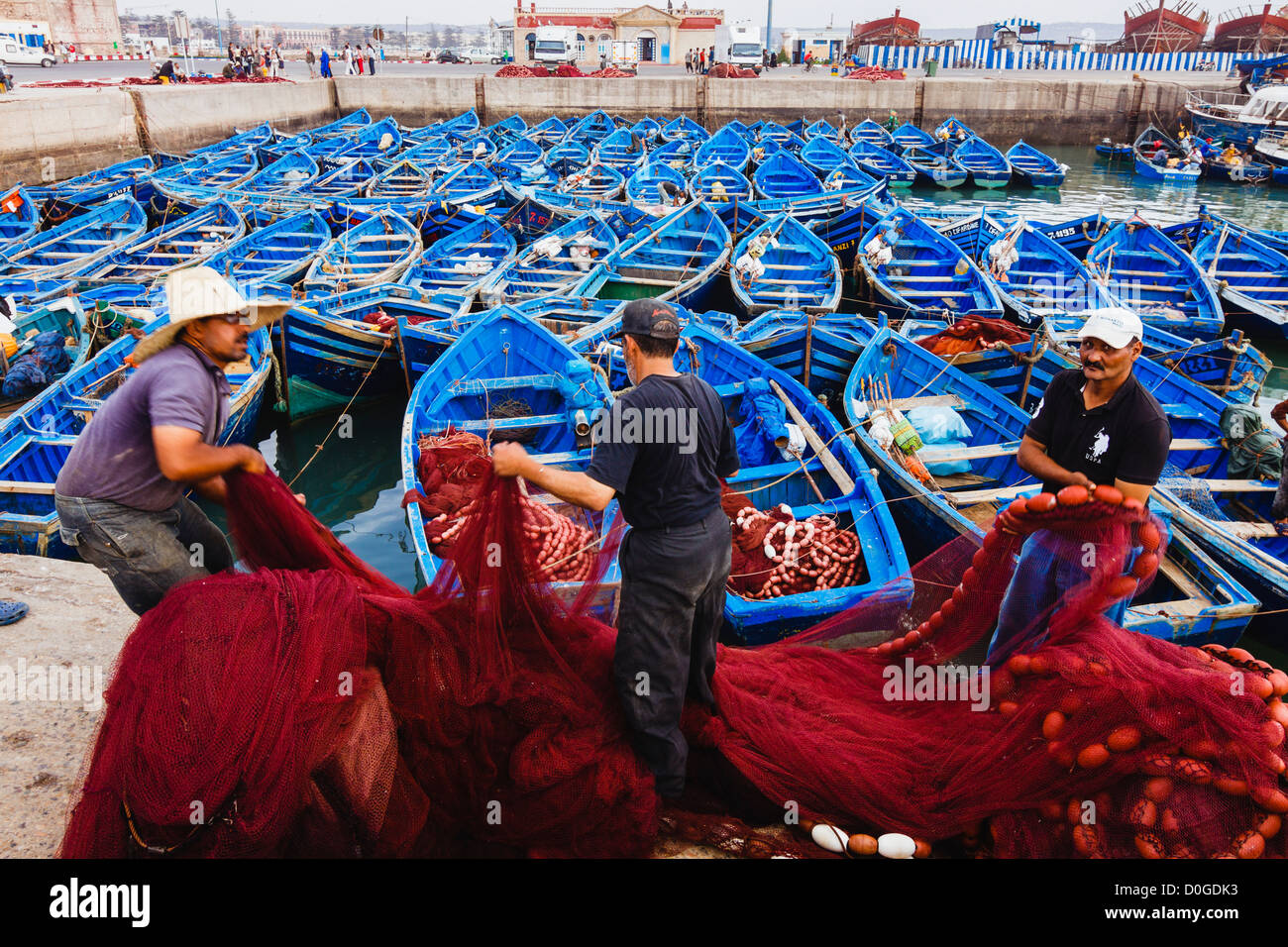 Collecting fishing nets hi-res stock photography and images - Alamy