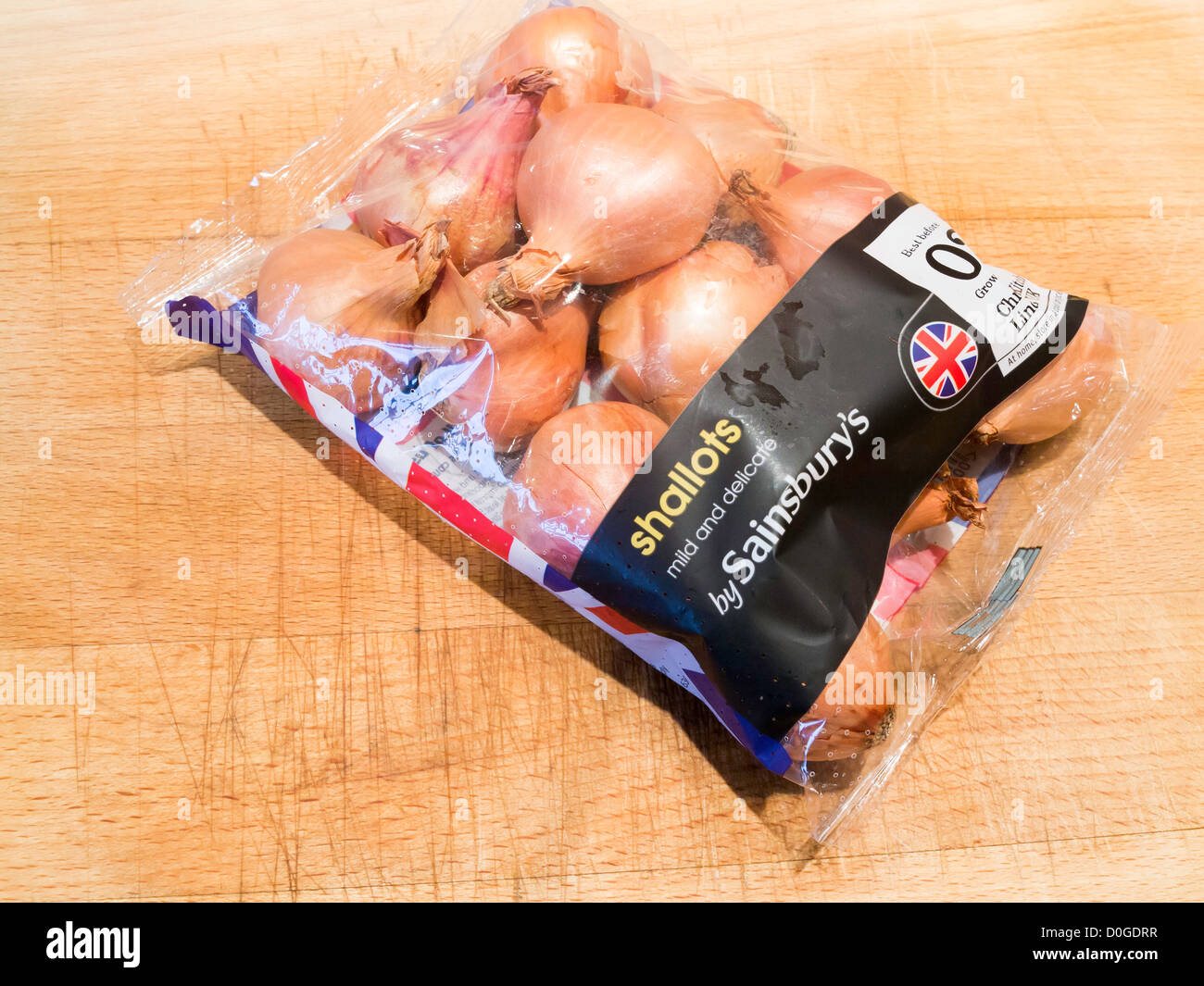 A pre packed bag of Shallots from Sainsbury's supermarket Stock Photo ...