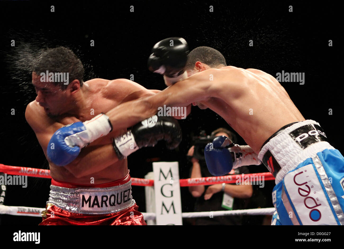 Jan Manuel Lopez (Blue/white trunks) retained his WBO World ...