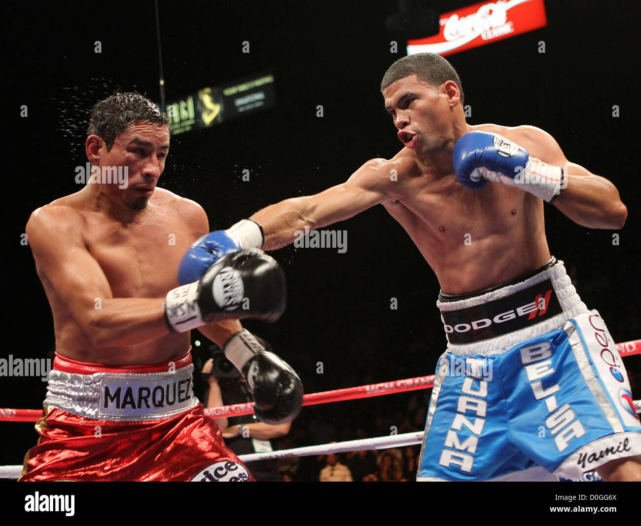 Jan Manuel Lopez (Blue/white trunks) retained his WBO World ...