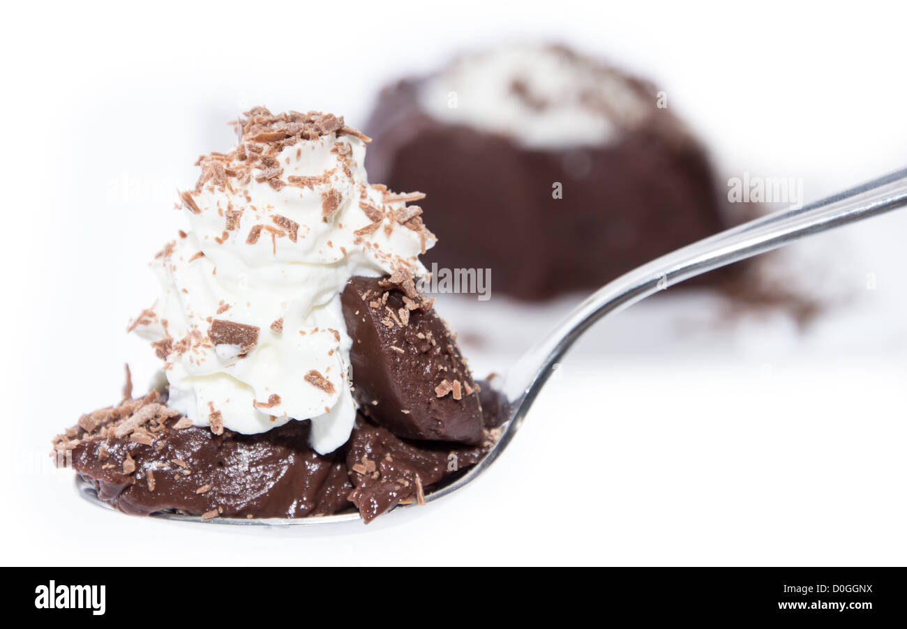 Pudding on a spoon isolated on white background Stock Photo - Alamy
