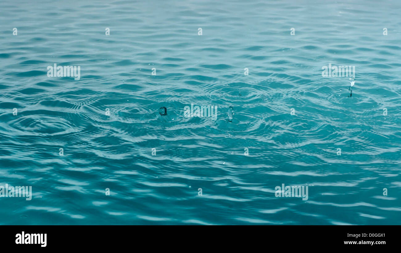 Water Dripping Into the Ocean Stock Photo - Alamy