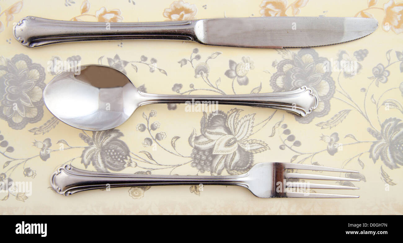 Cutlery on a table in vintage style Stock Photo - Alamy