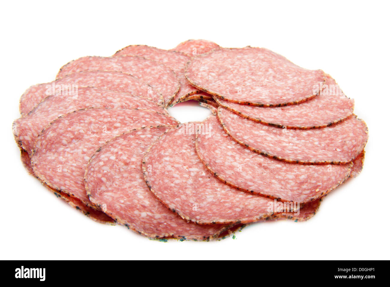 Circle of pepper salami isolated over white Stock Photo - Alamy