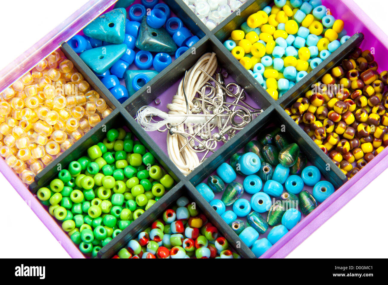 Different kind of colorful beads close up on a white background Stock ...