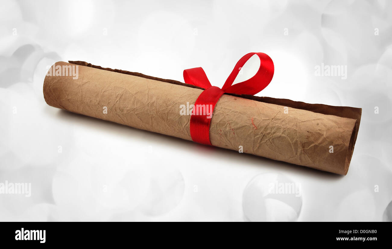 Diploma with red ribbon with lights in the background Stock Photo - Alamy