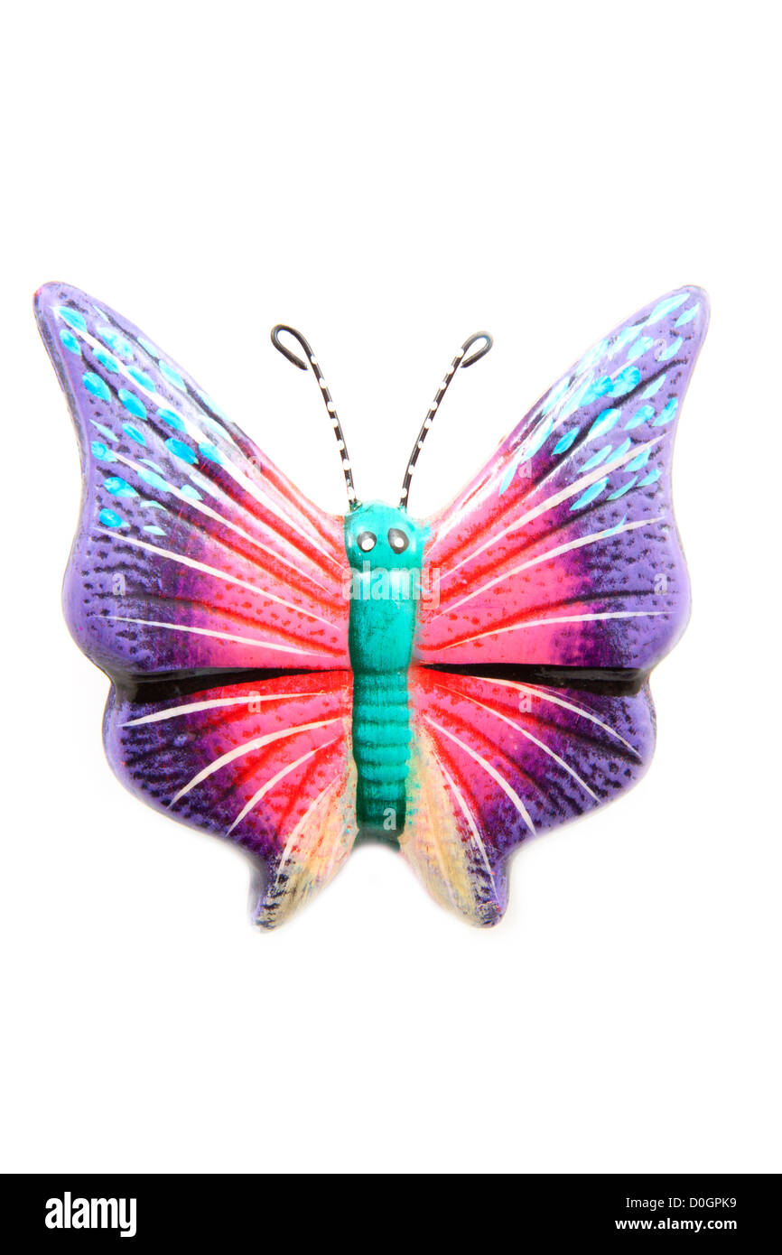 Colorful fake butterfly isolated on a white background Stock Photo - Alamy