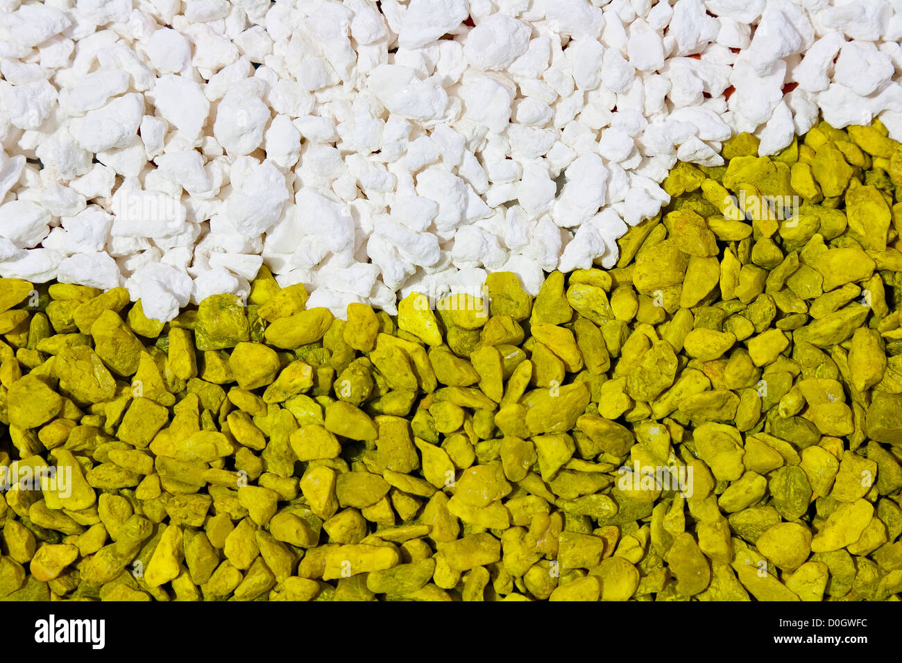 A closeup of colorful white and green stones sand Stock Photo - Alamy