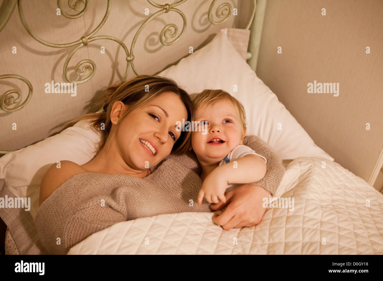 Mother and son resting Stock Photo - Alamy