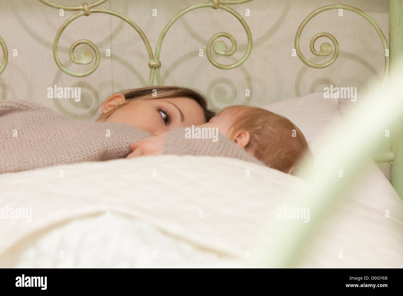 Mother and son resting Stock Photo - Alamy