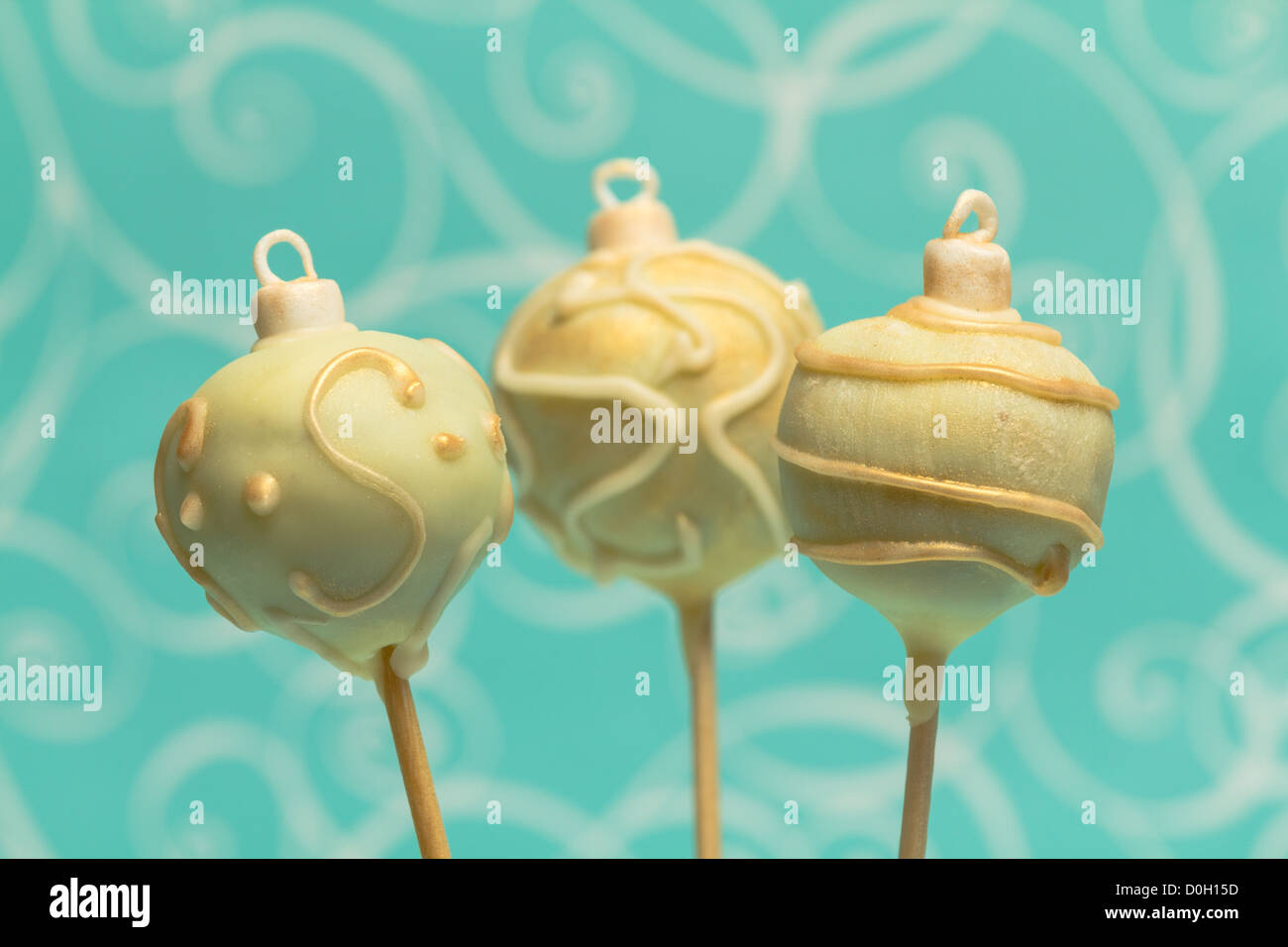 Christmas cake pops on turquoise background Stock Photo - Alamy